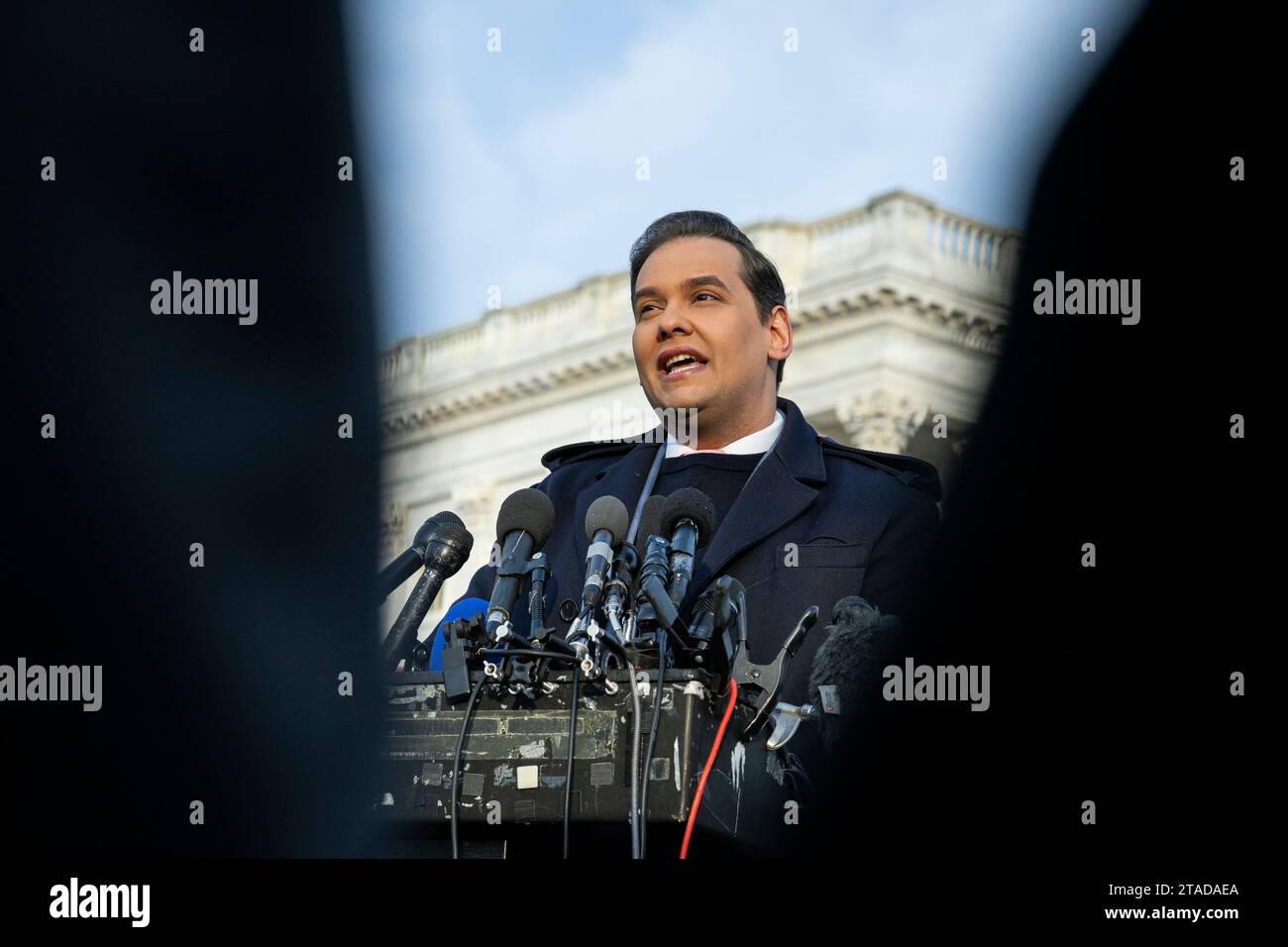 Representative George Santos (R-N.Y.) speaks to media during a press ...