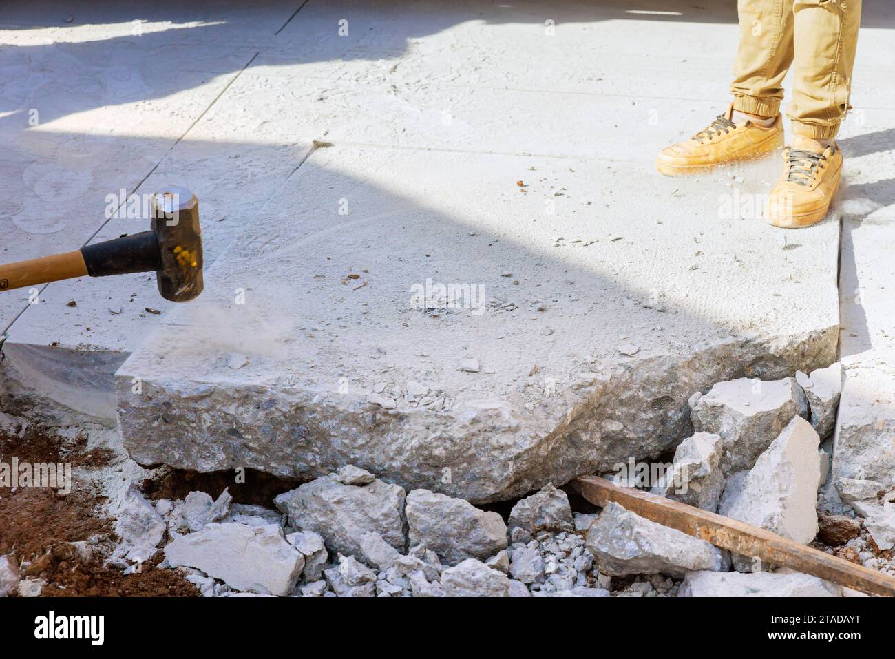 Repairing works on destroyed concrete sidewalk demolition pavement in ...