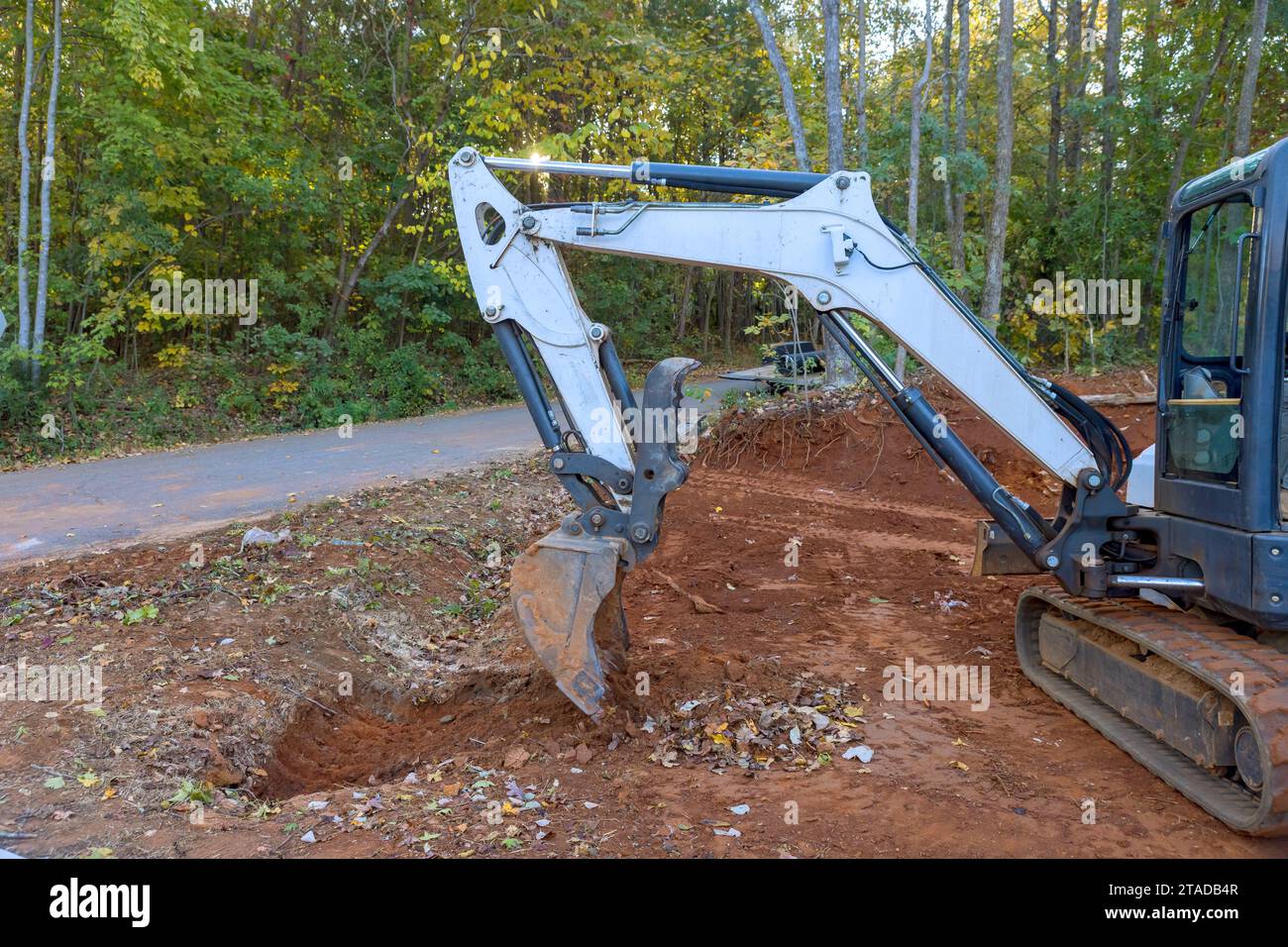 Utilizing tractor for ditch excavation in drainage concrete sewage a ...