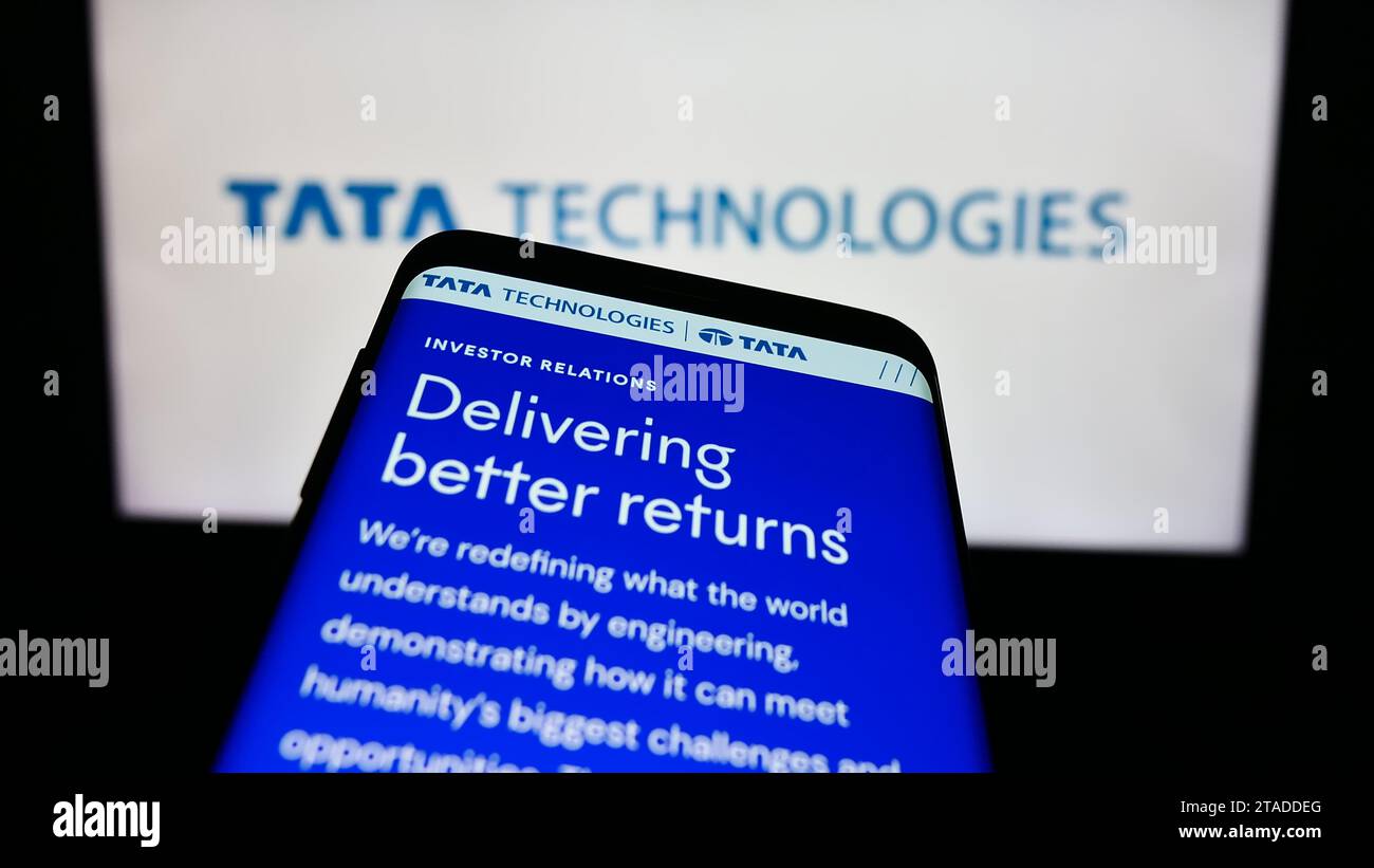 Mobile phone with webpage of Indian engineering company Tata ...