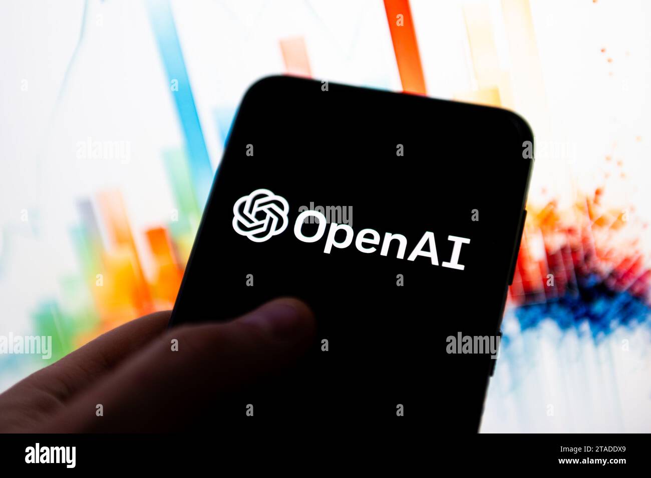 In this photo illustration a OpenAI Chat GPT logo seen displayed on a ...