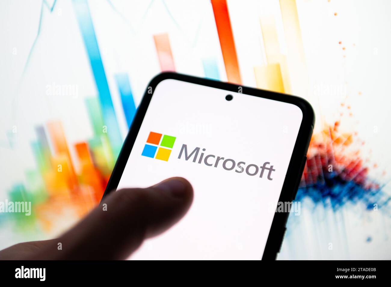 In this photo illustration a Microsoft logo seen displayed on a ...