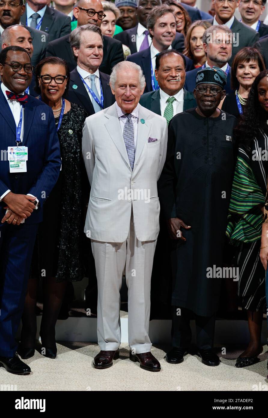 King Charles III joins leaders and delegates for a family photo during ...