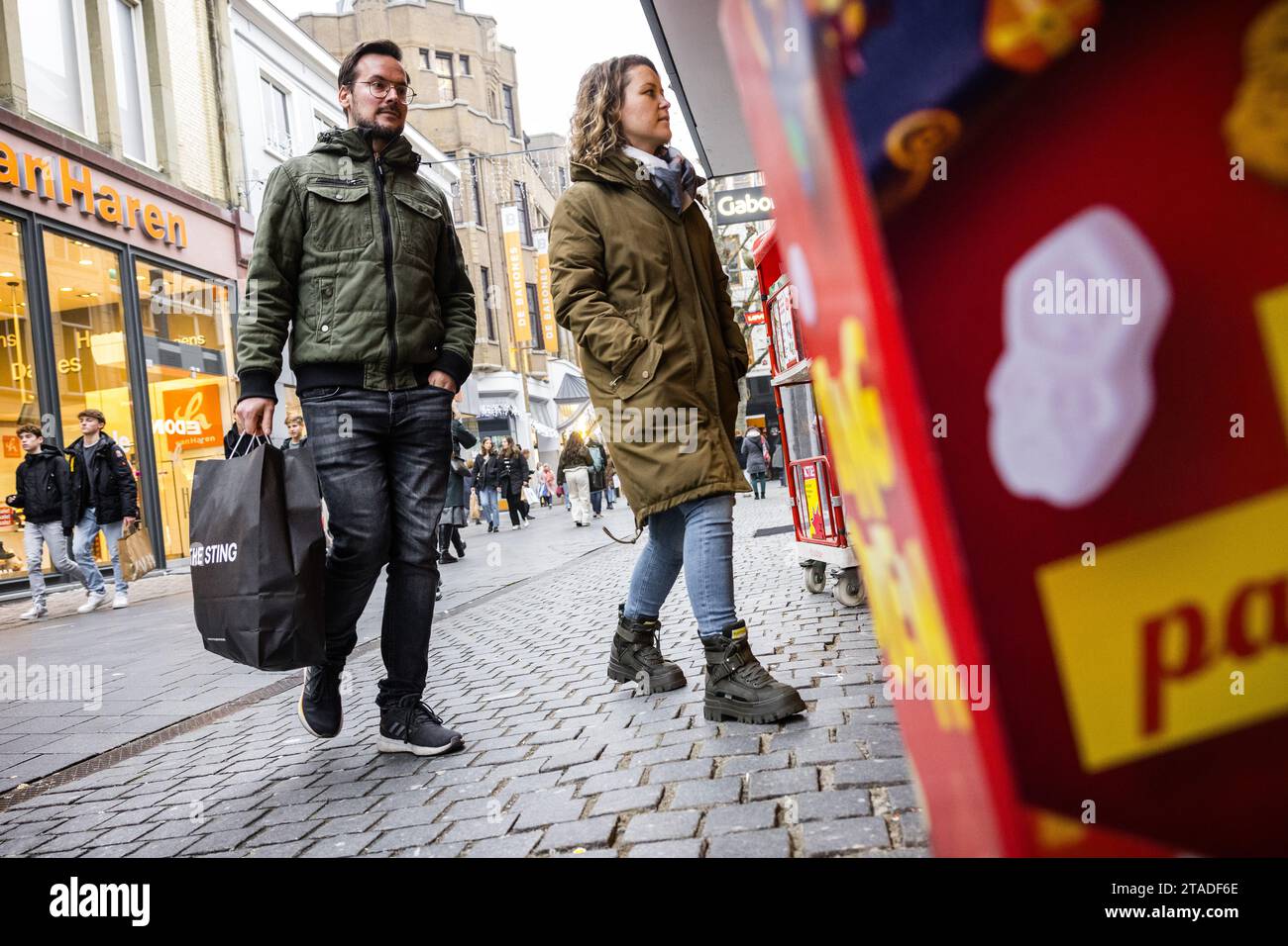 BREDA - Shoppers in the city center of Breda, where, among other things ...