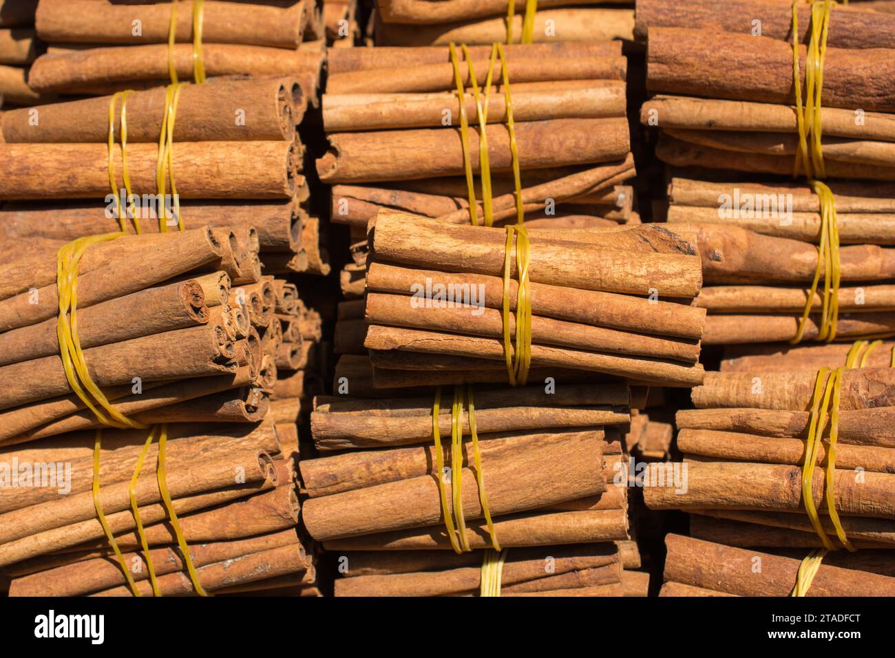 Stack of of Cinnamon sticks in view as background Stock Photo - Alamy