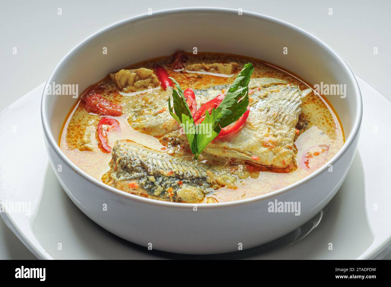 fish curry soup in a ready-to-eat bowl Stock Photo - Alamy