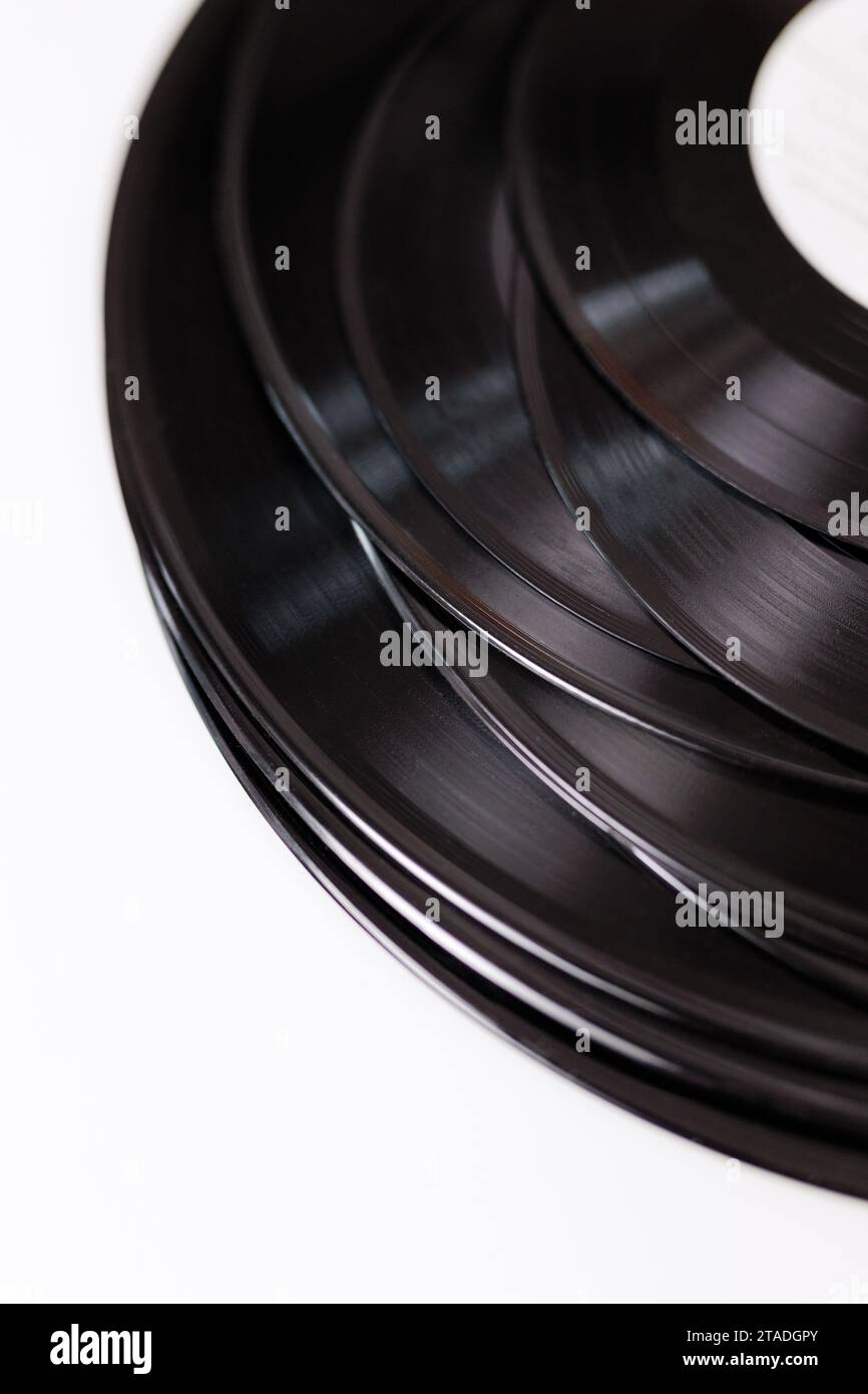A bunch of old vinyl disks on white background Stock Photo - Alamy