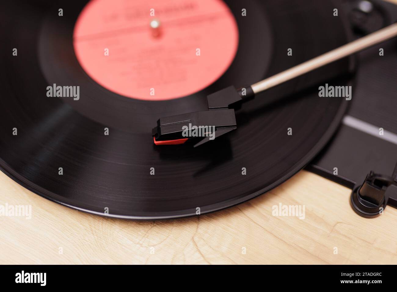 Top view of vintage phonograph playing a black vynil record Stock Photo ...