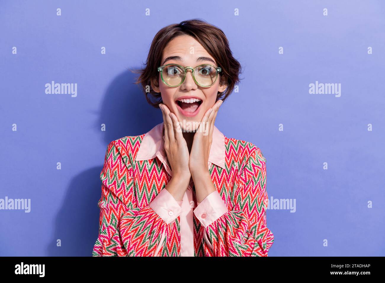 Photo portrait of pretty young girl touch cheeks excited reaction ...