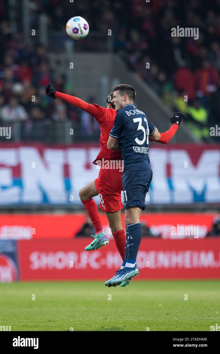 Keven SCHLOTTERBECK VFL Bochum in aerial battle with Eren DINKCI 1. FC ...