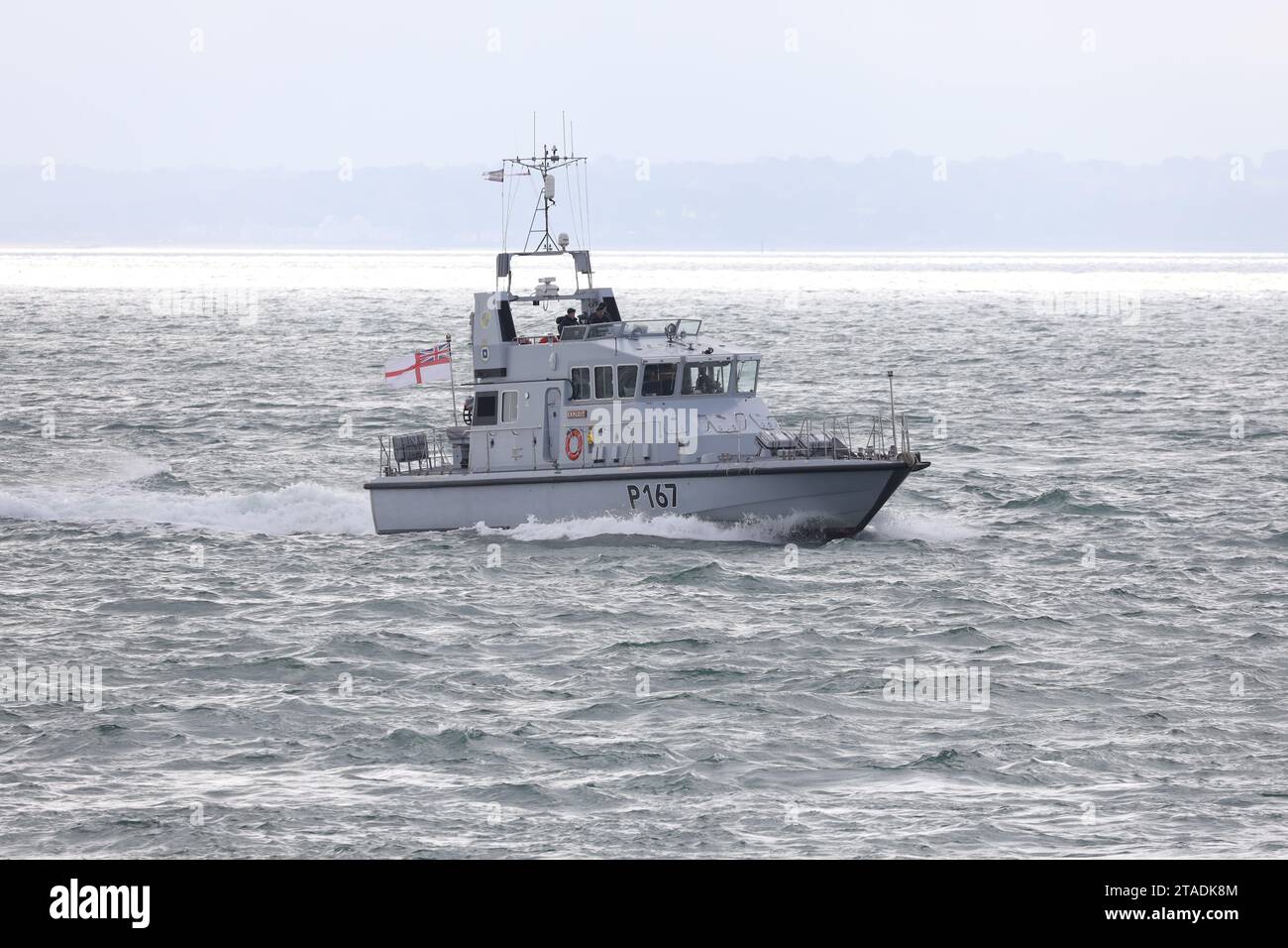 The Royal Navy P2000 class fast training boat HMS EXPLOIT (P167) arriving at the Naval Base ...