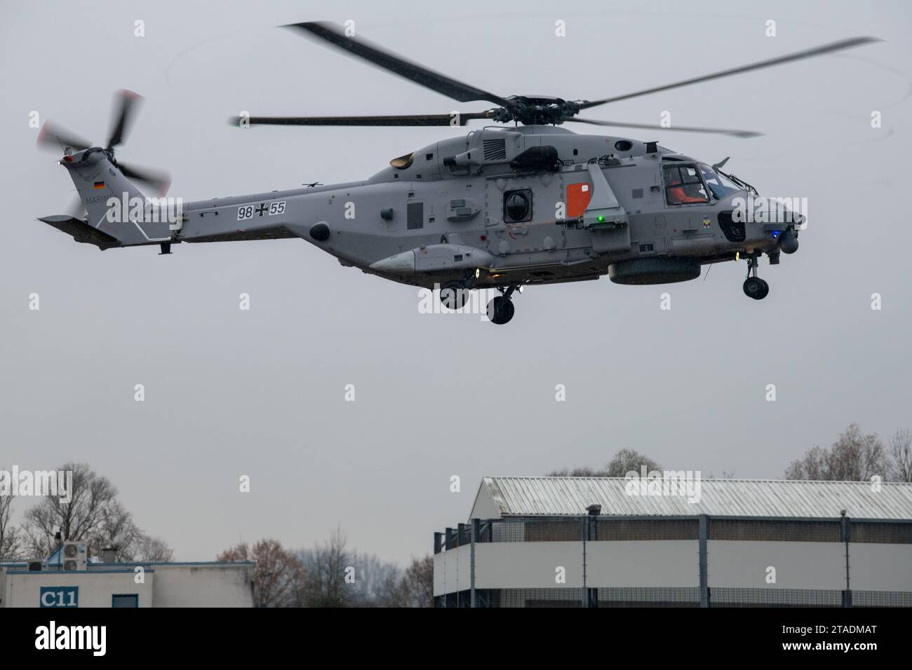 30 November 2023, Bavaria, Donauwörth: An NH90 Sea Tiger combat helicopter flies over the ...
