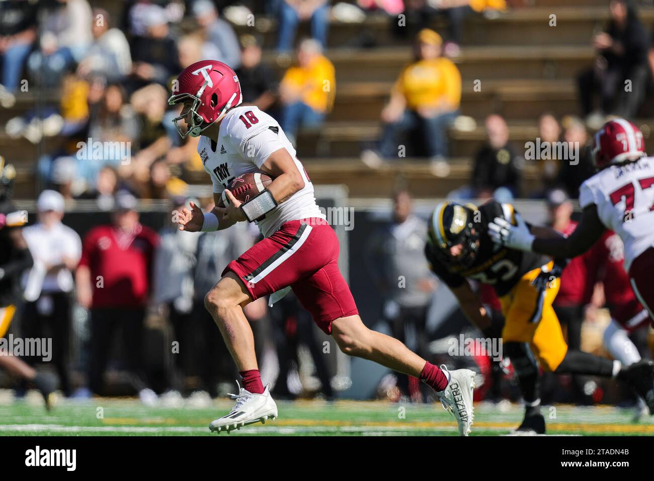 NOV 25, 2021: Troy Trojans quarterback Gunnar Watson (18) runs for a ...