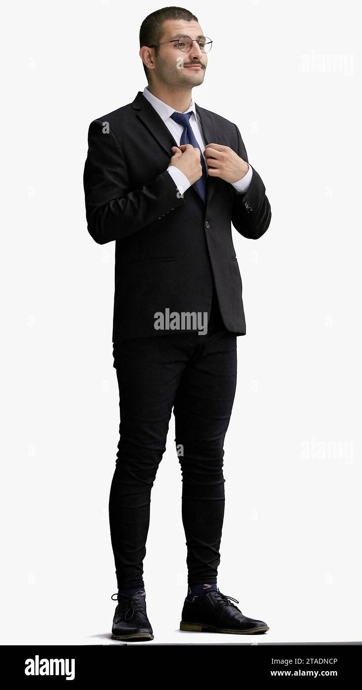 full-length portrait of a young man. standing isolated on white ...