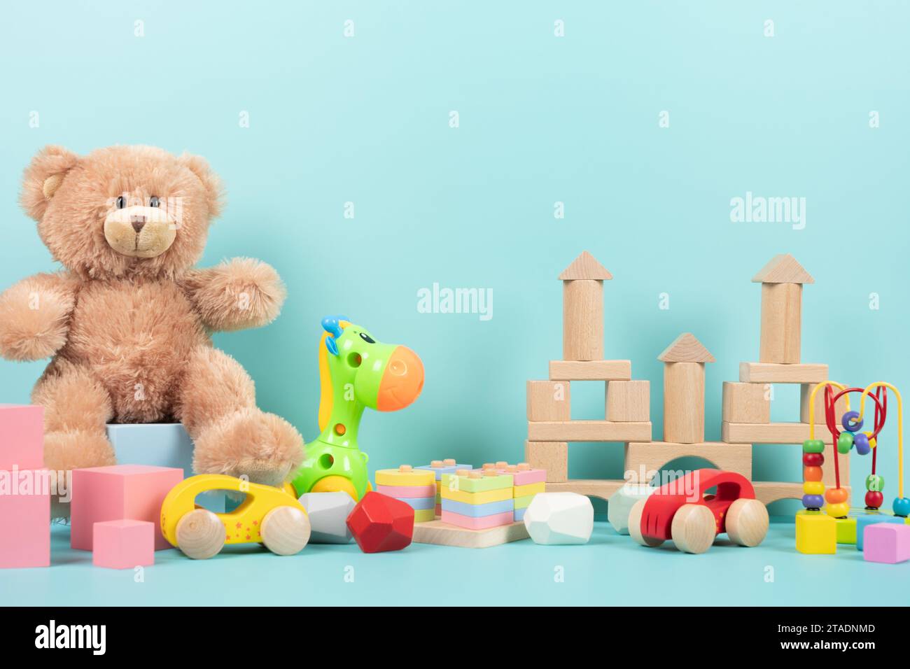 Kids toys collection with teddy bear, wooden blocks for children games ...