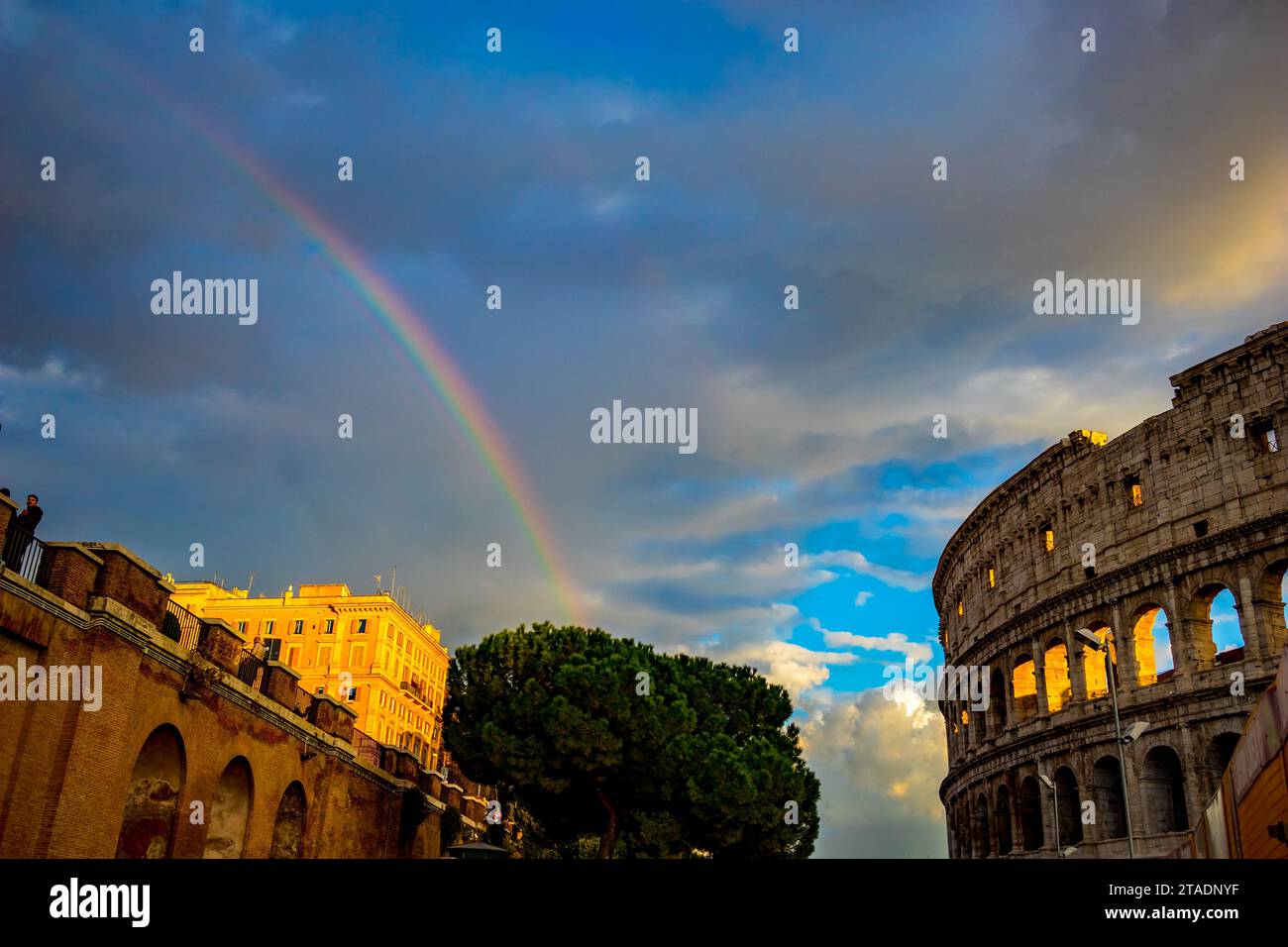The colosseum with rainbow by its left side, Rome, the capital city of ...