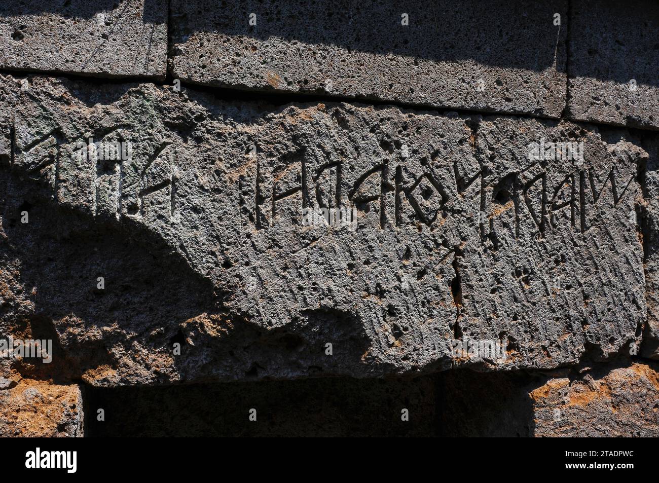 On lintel over entrance to a chamber tomb in the Etruscan necropolis of ...