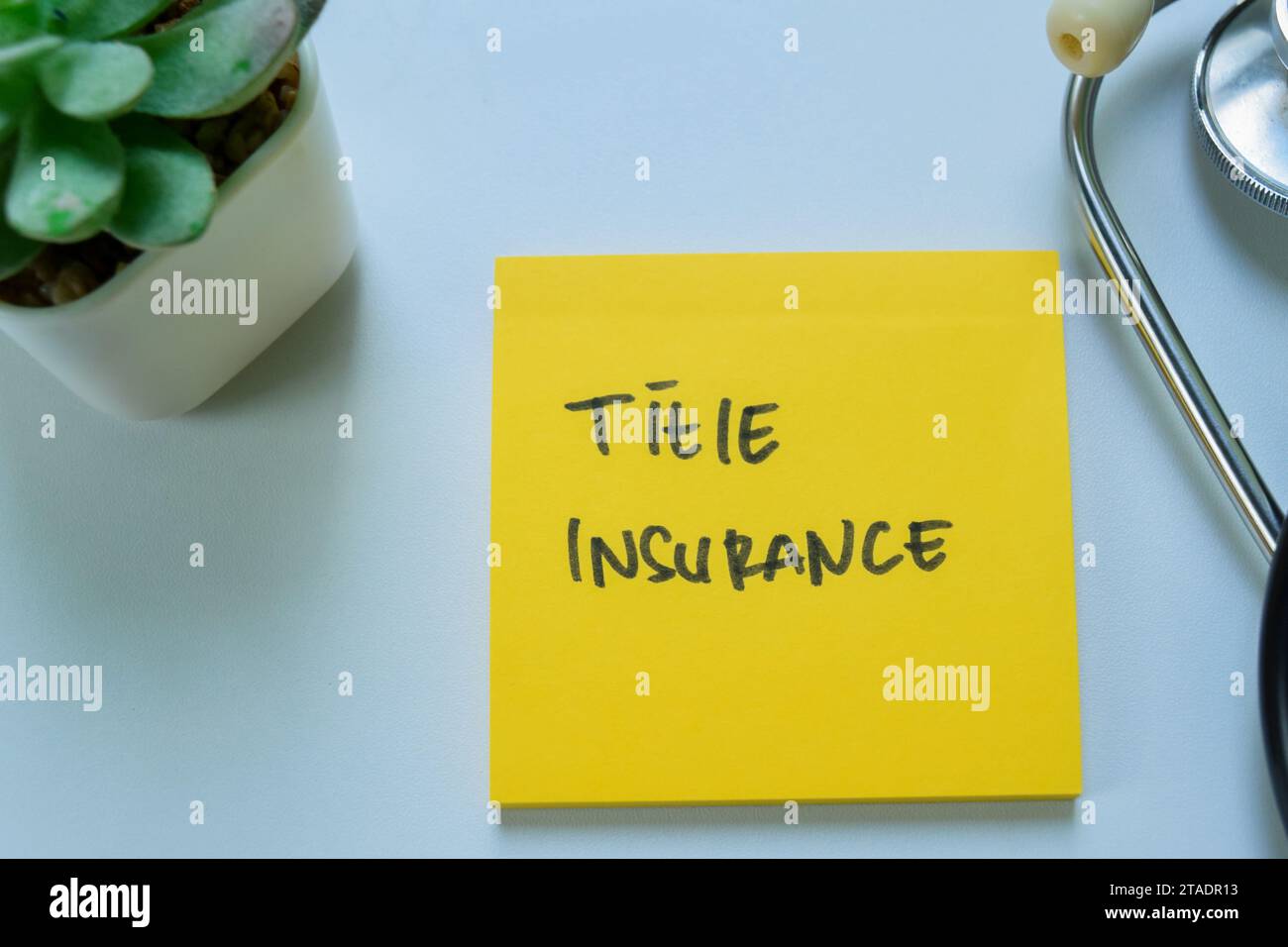 Concept of Title Insurance write on sticky notes with stethoscope ...