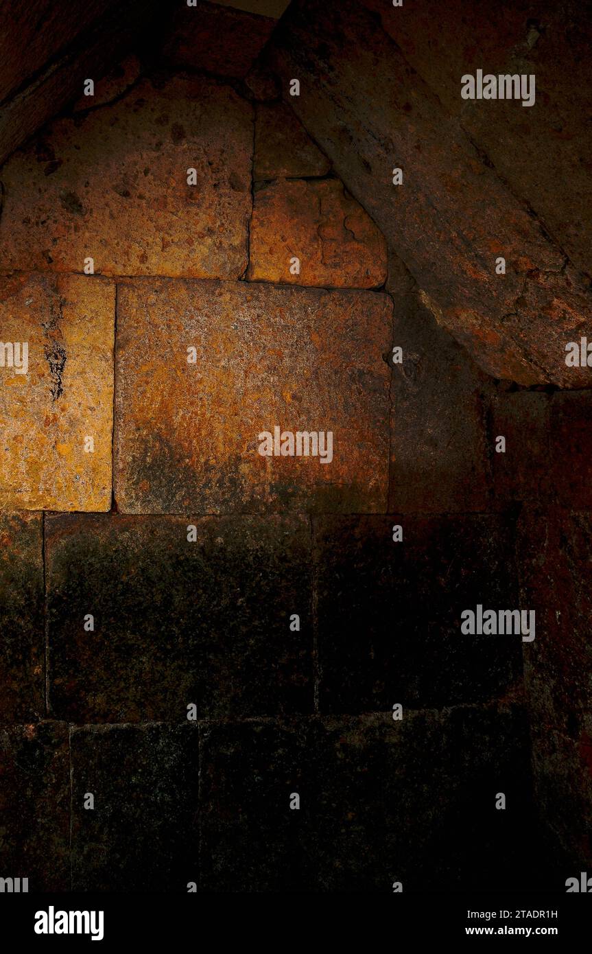 Blocks of tufa in dry masonry and pseudovault roof of an Etruscan tomb ...