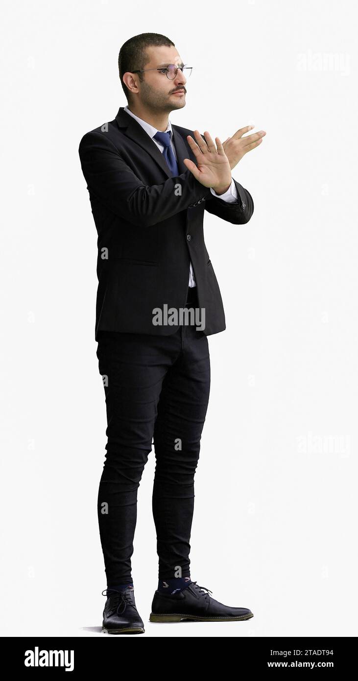 young man in full growth. isolated on white background showing cancel ...