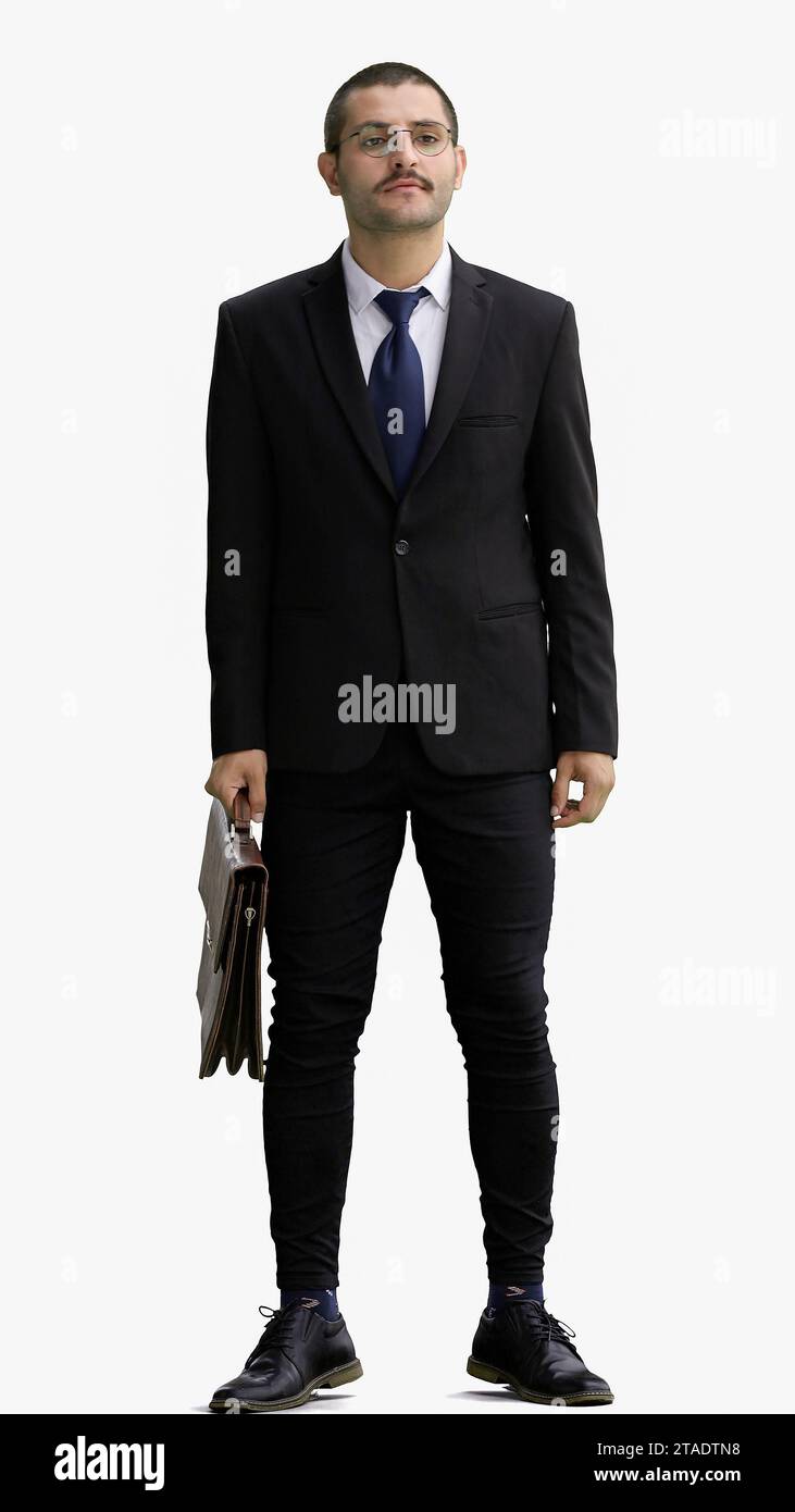 full-length portrait of a young man. standing isolated on white ...