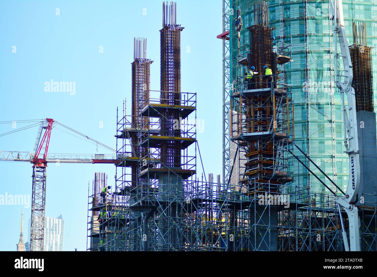 High rise building under construction. Installation of glass facade ...