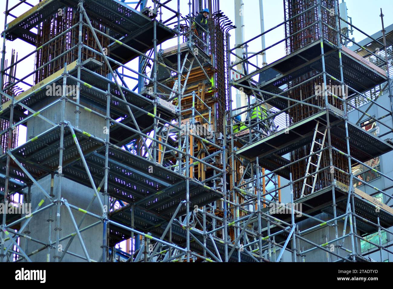 High rise building under construction. Installation of glass facade ...