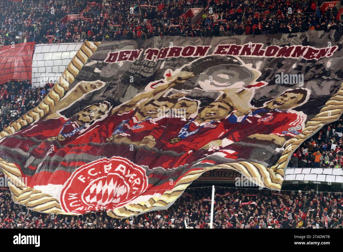 Fcbayern fans celebrate with a large bilboard hi-res stock photography ...