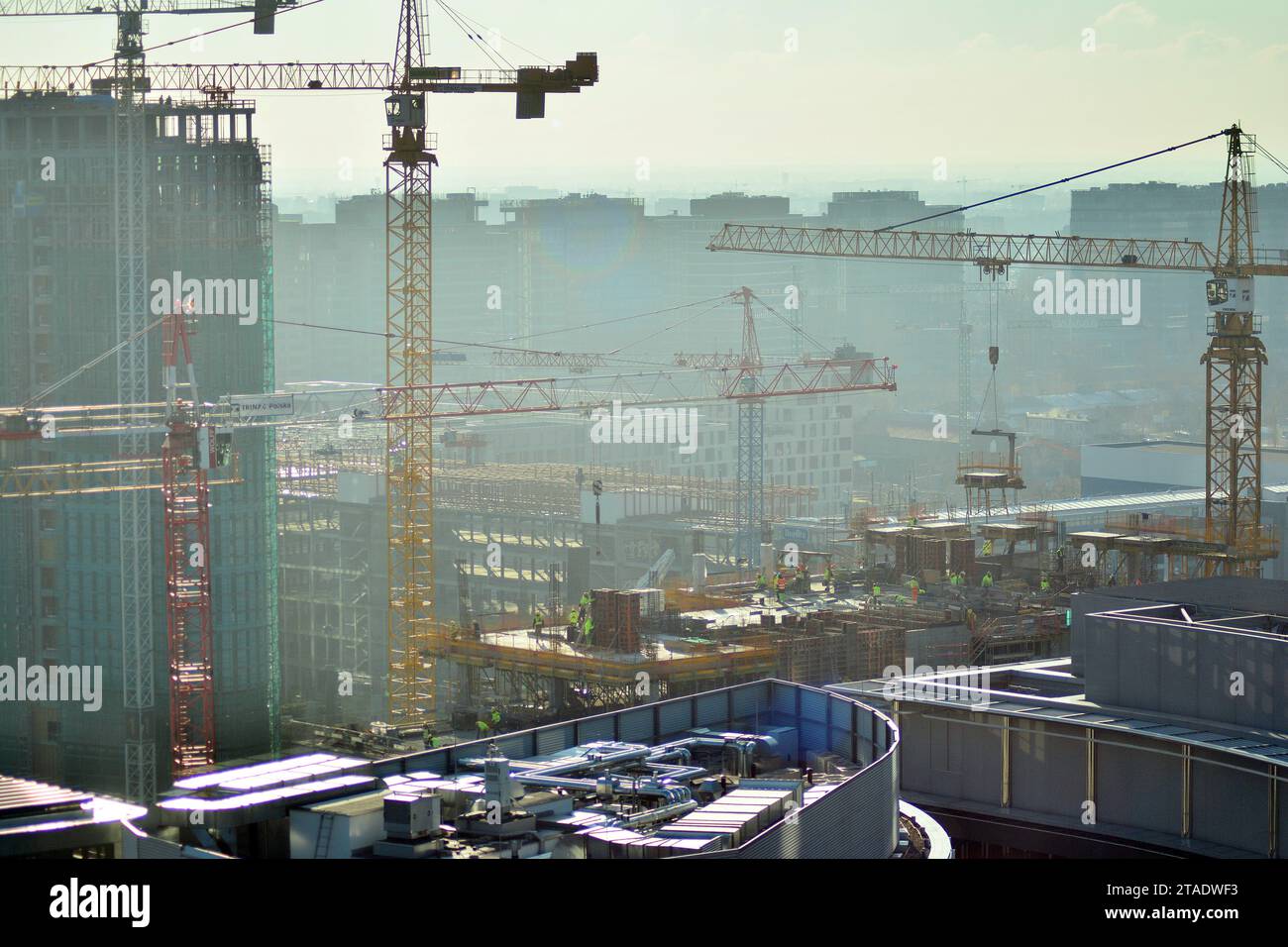 High rise building under construction. Installation of glass facade ...