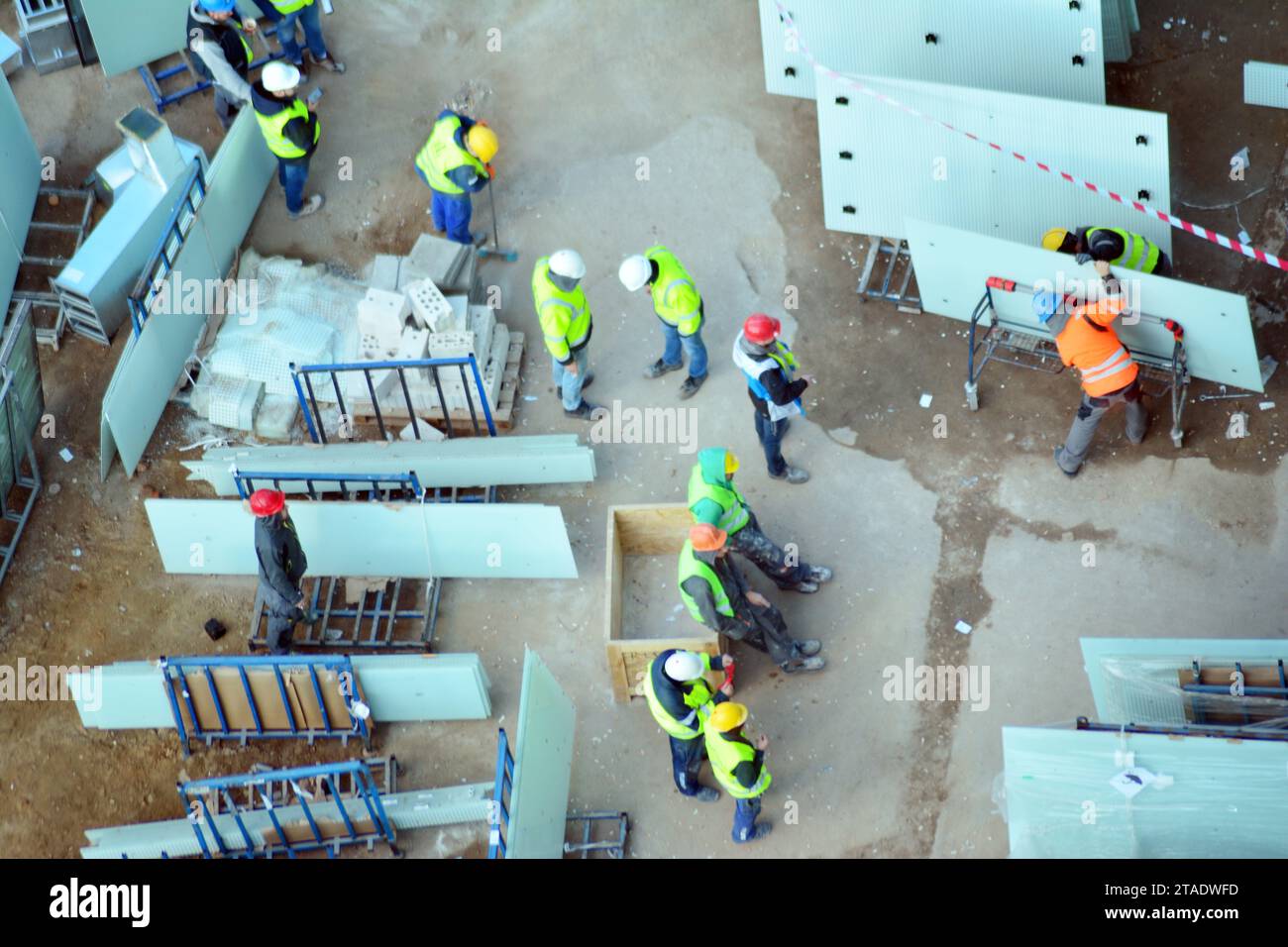 High rise building under construction. Installation of glass facade ...