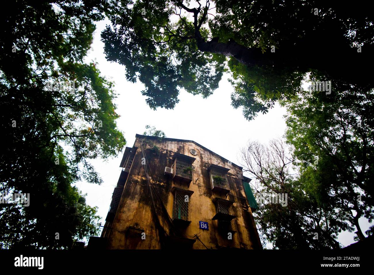 An old traditional-style housing block in the centre of Hanoi, Vietnam ...