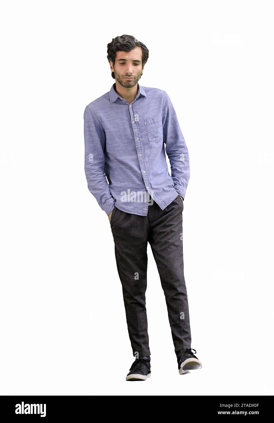 full-length portrait of a young man. standing isolated on white ...