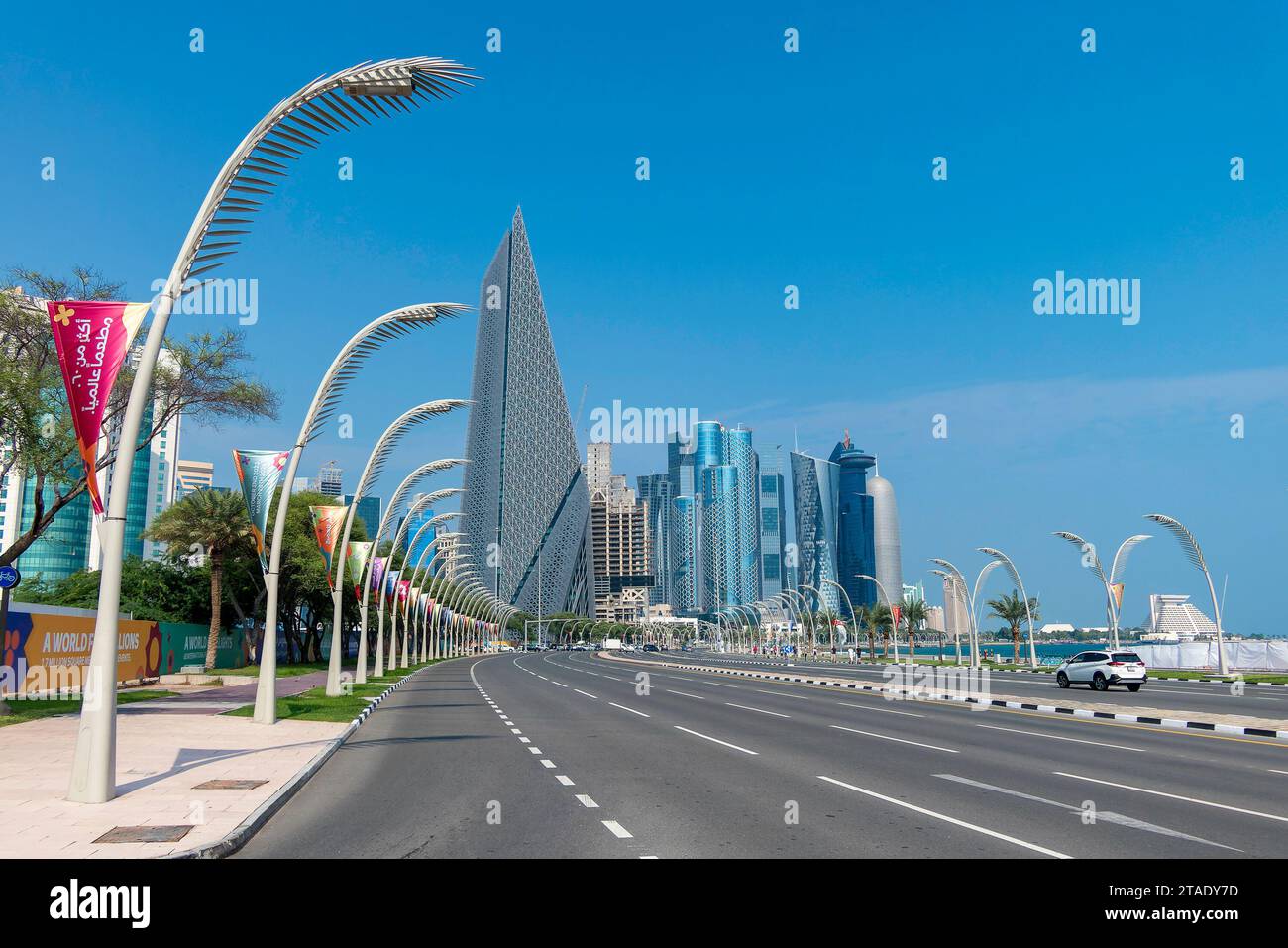 Doha, Qatar, October 31, 2023. Road leading to skyscrapers with ...