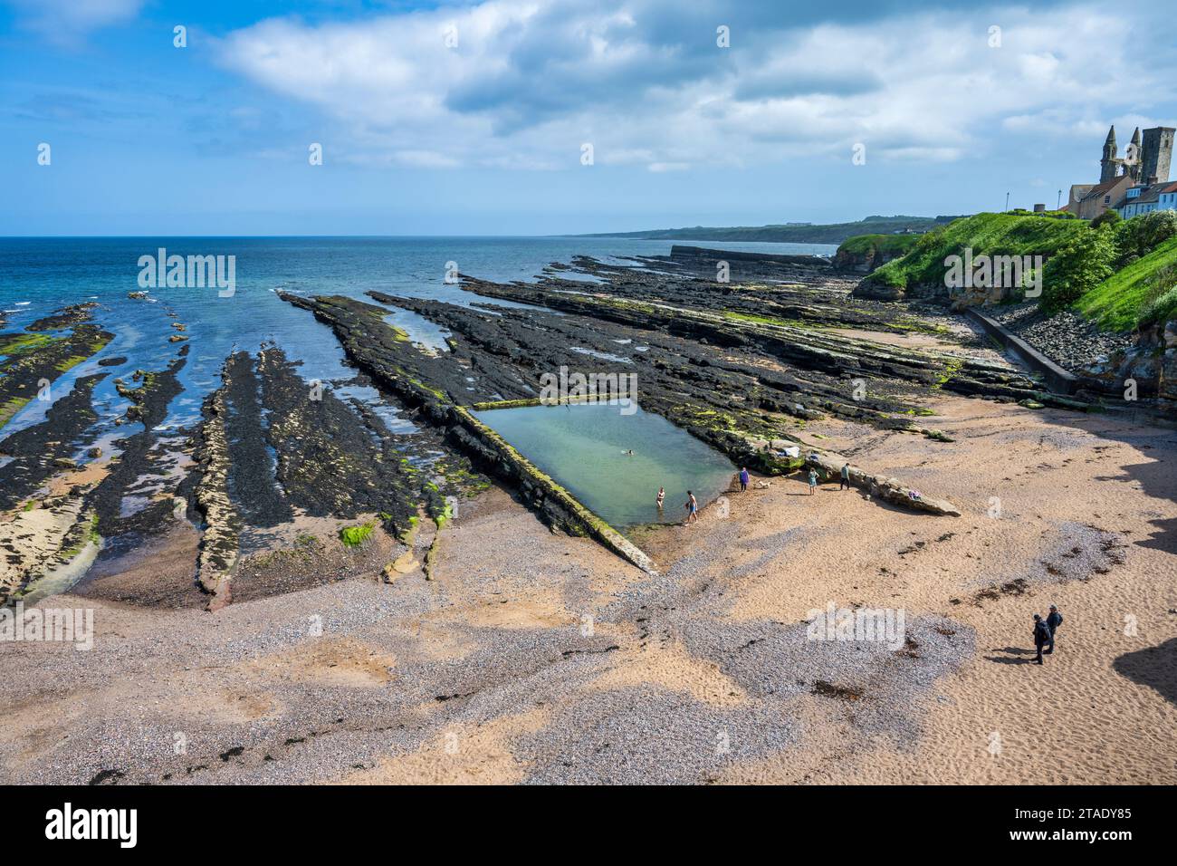 Swimmers in Castle Sands tidal pool below St Andrews Castle in the ...