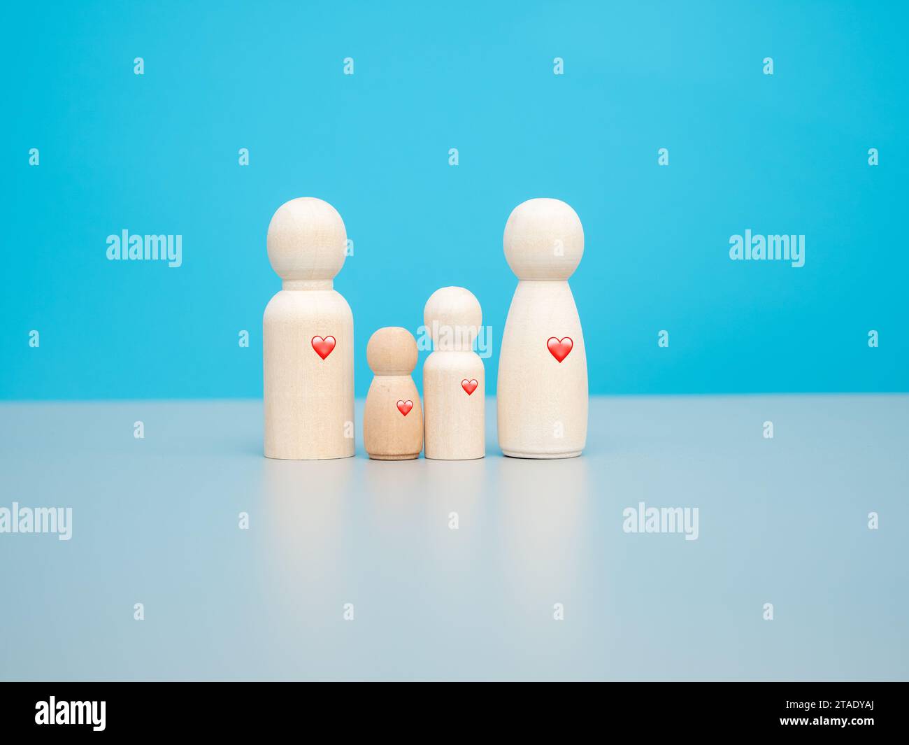 Wooden figures. Family on a gray background. Family values concept ...
