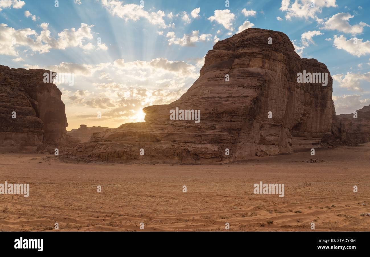 Morning sun shines over rocky desert formations, typical landscape in ...