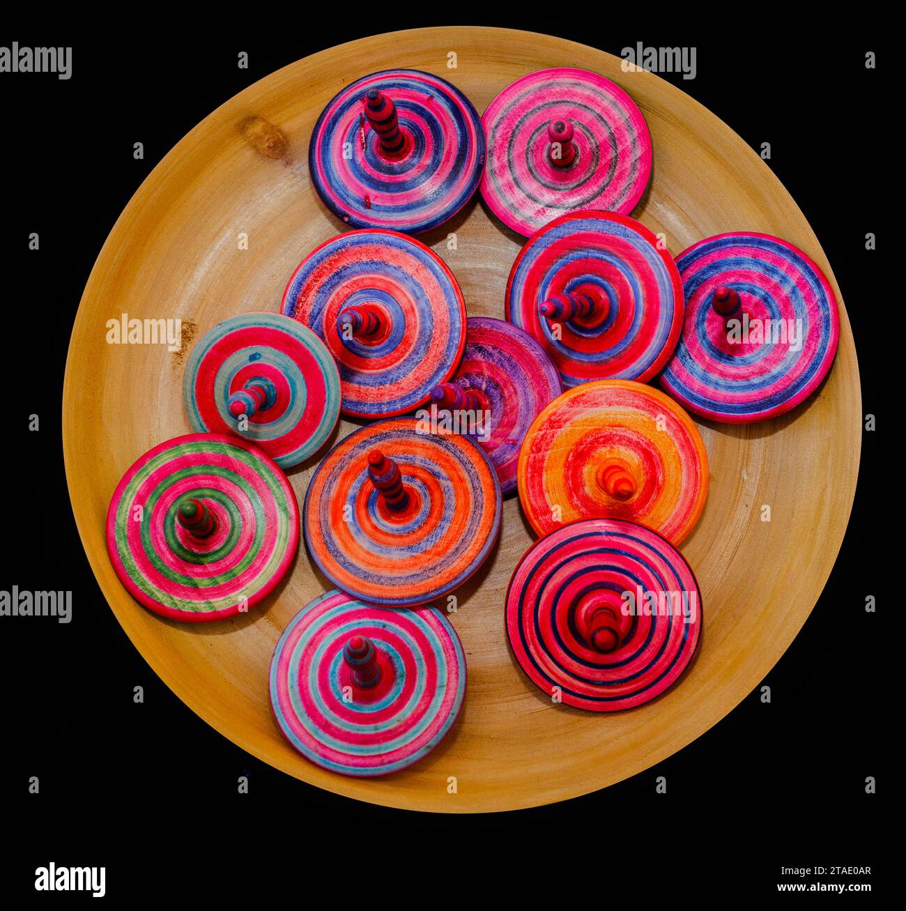 Wooden colored spinning tops hi-res stock photography and images - Alamy