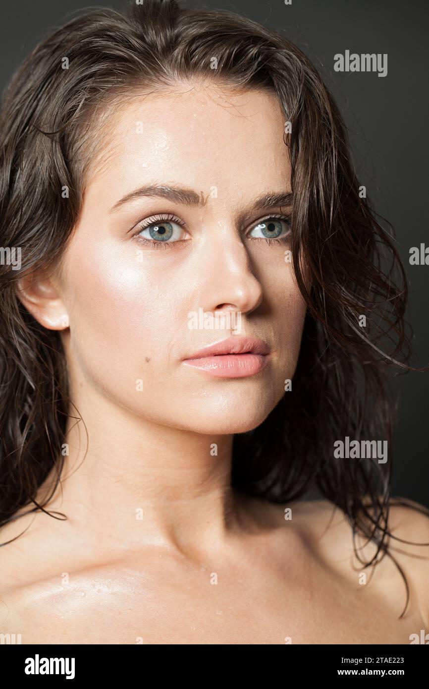 Lovely female model with natural makeup and healthy clear fresh skin ...