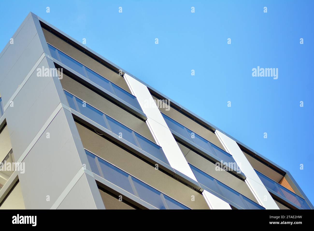 New apartment building with glass balconies. Modern architecture houses ...