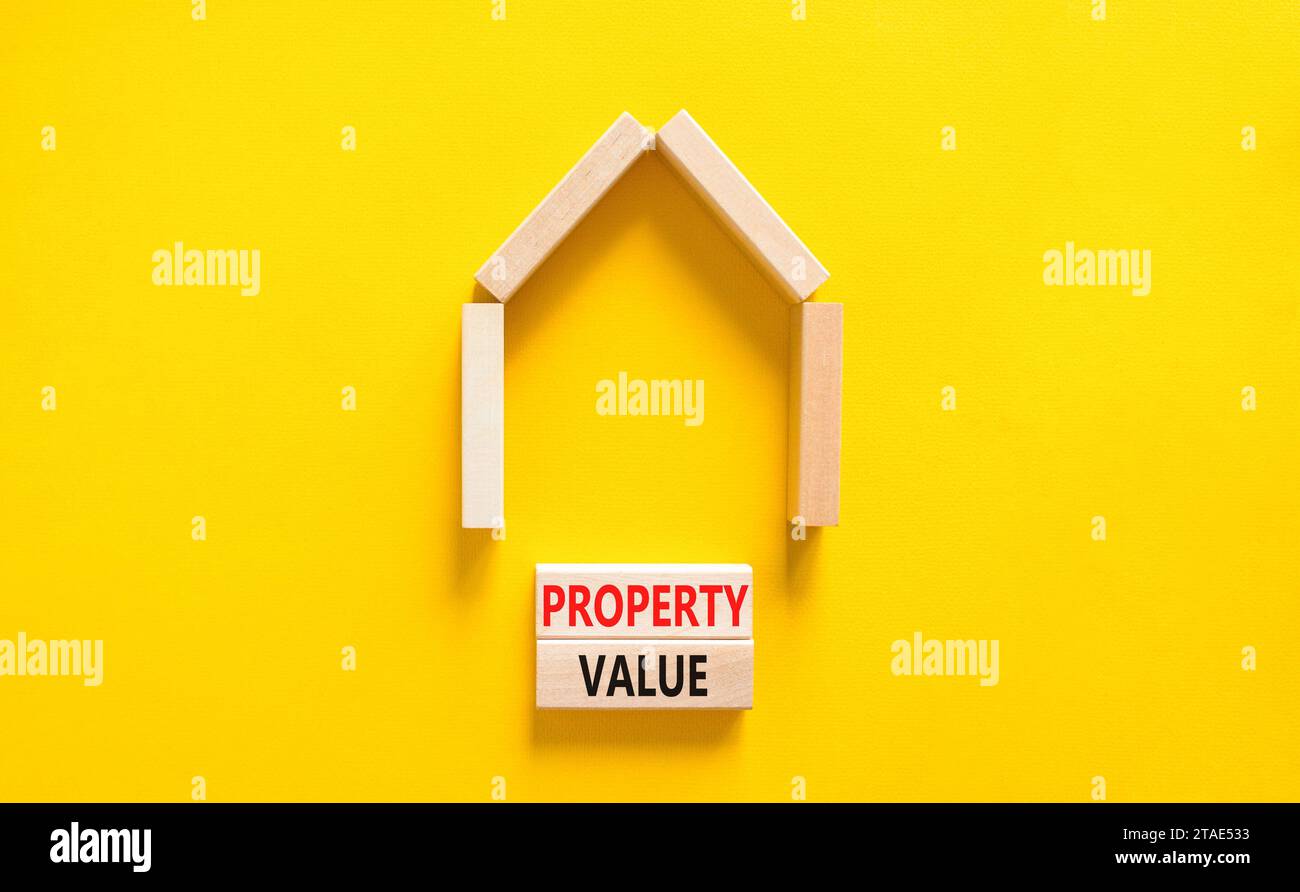 Property value symbol. Concept words Property value on beautiful wooden ...