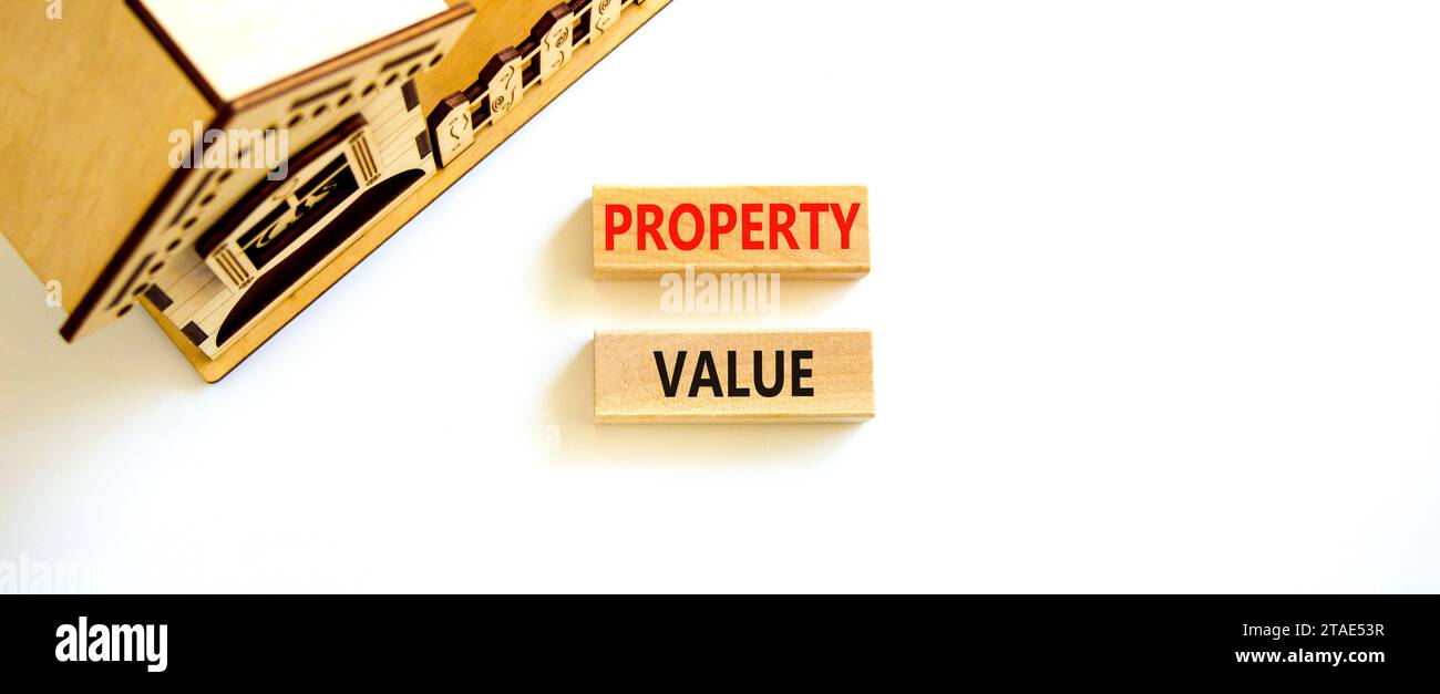 Property value symbol. Concept words Property value on beautiful wooden ...
