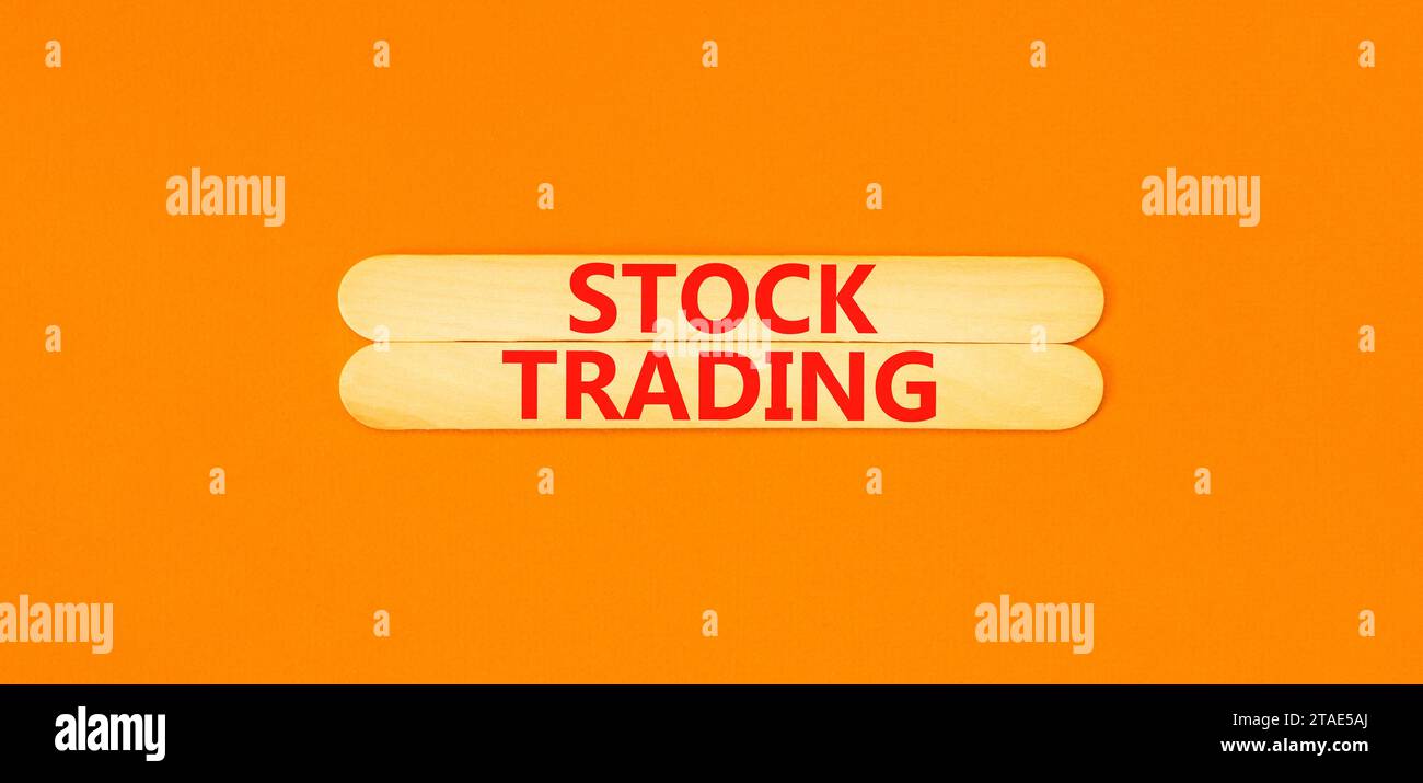 Stock trading symbol. Concept words Stock trading on beautiful wooden ...