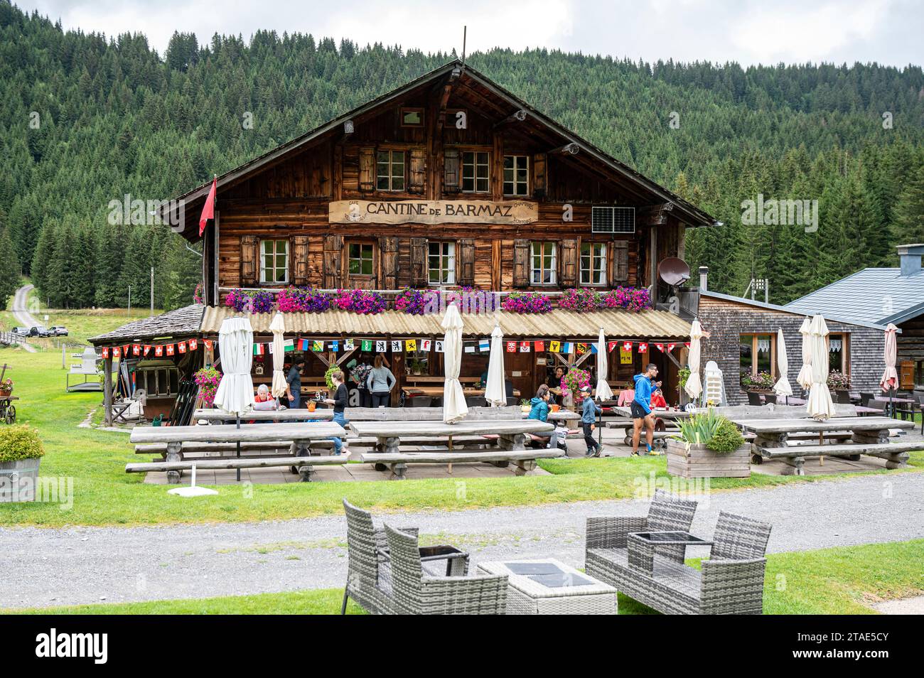 Switzerland, Valais, Champéry, Tour des Dents Blanches, group of hikers arriving at the Cantine ...
