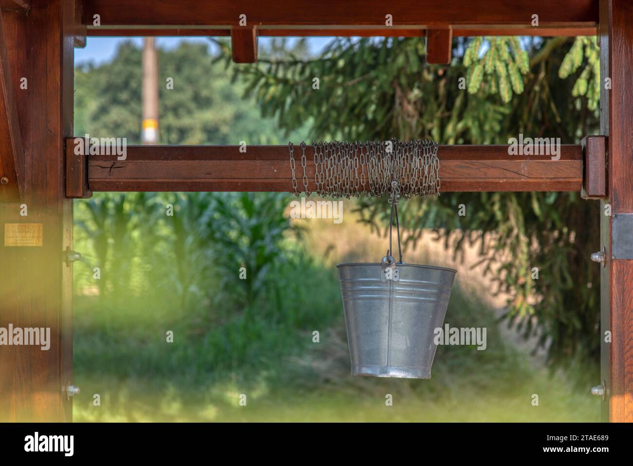 Rustic stone well with bucket and drinking water, Radenci, Slovenia ...
