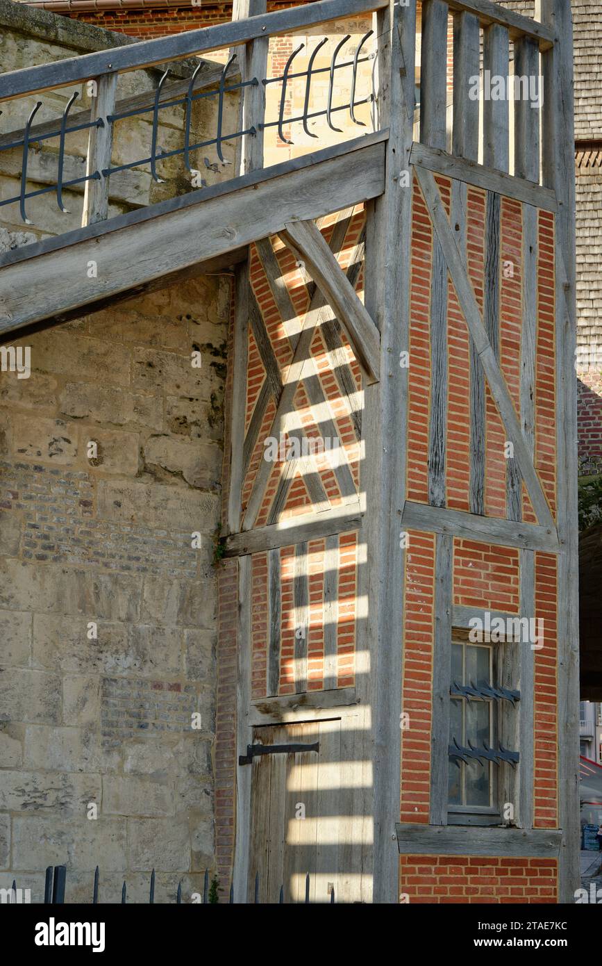 Normandy brick and wood architecture. Tower and staircase in the ...