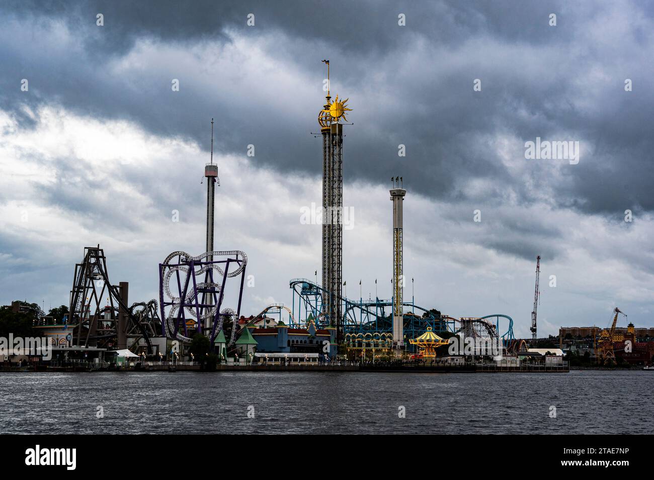 Stockholm's Luna Park ( Grona Lund ) seen from the sea in a cloudy day ...