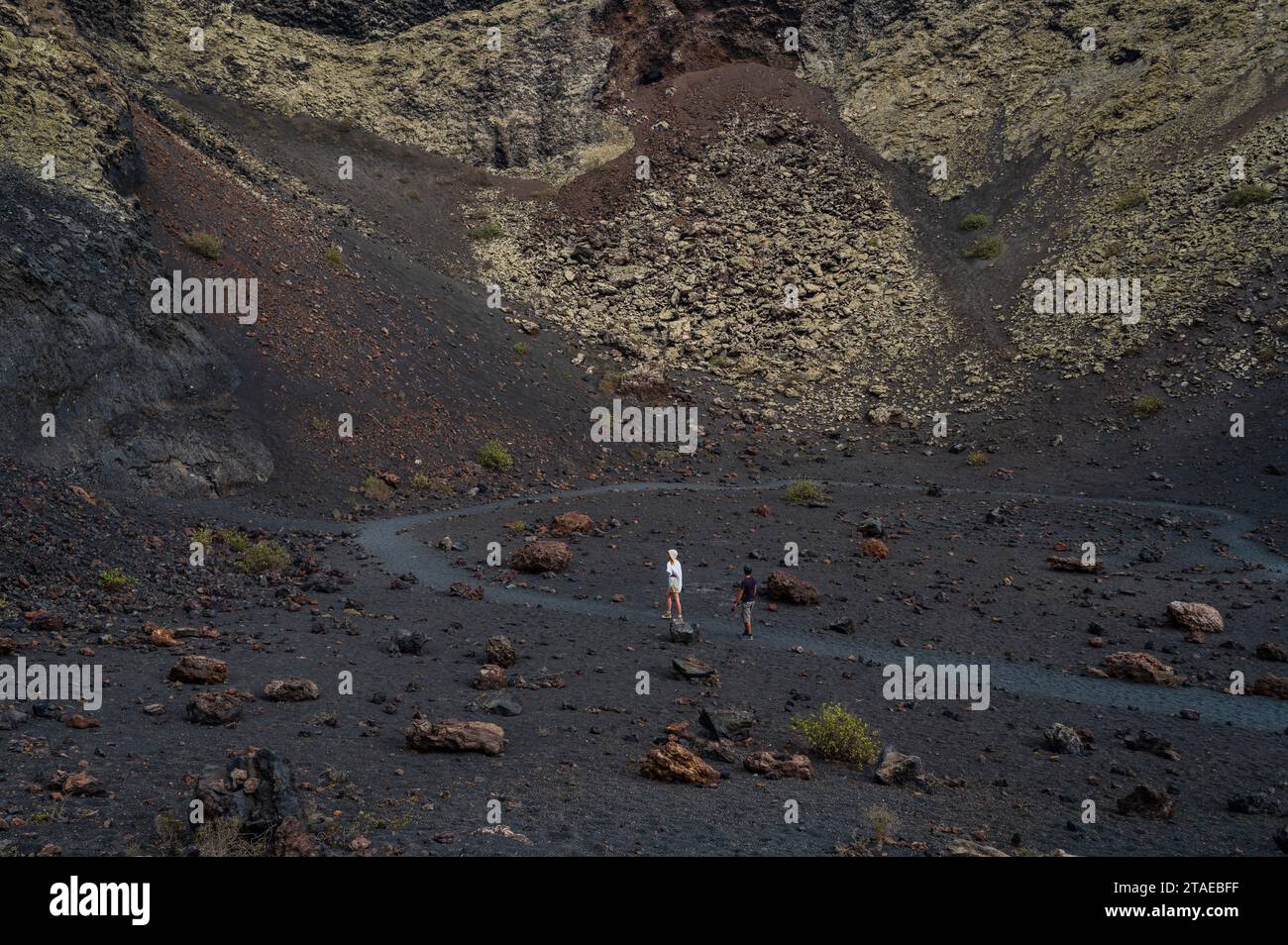 Volcan del Cuervo (Crow volcano) a crater explored by a loop trail in a ...