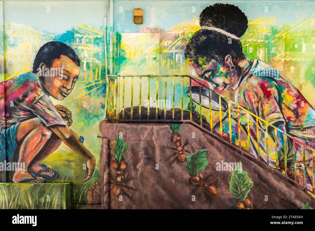 France, Guiana, Cayenne, mural depicting two children observing nature ...