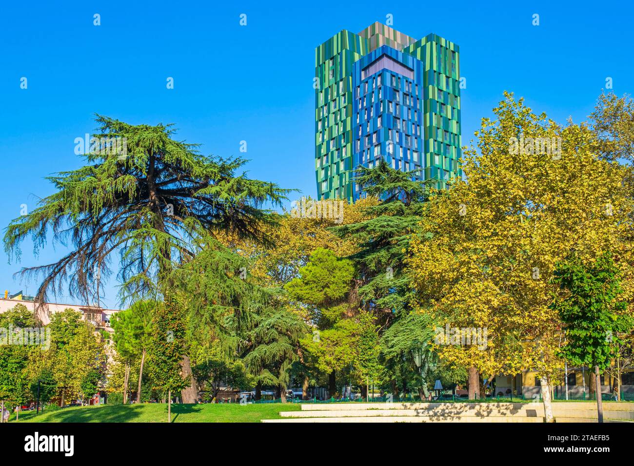 Albania, Tirana, Rinia park and the ALBAN TOWER TIRANA (ATTI) built by ...