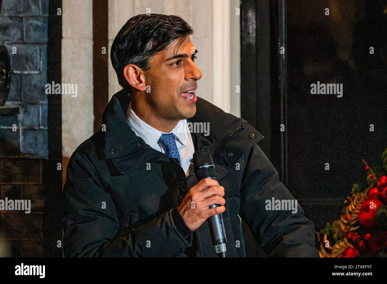 London, UK. 30th Nov, 2023. The Prime Minister, Rishi Sunak switches on ...